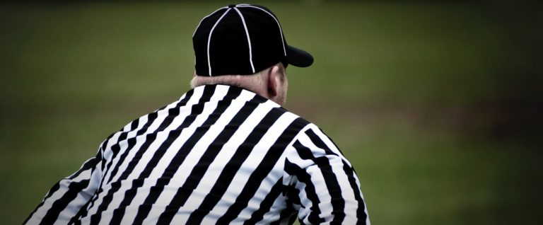 referee watching a game Consistency - Leadership Vision