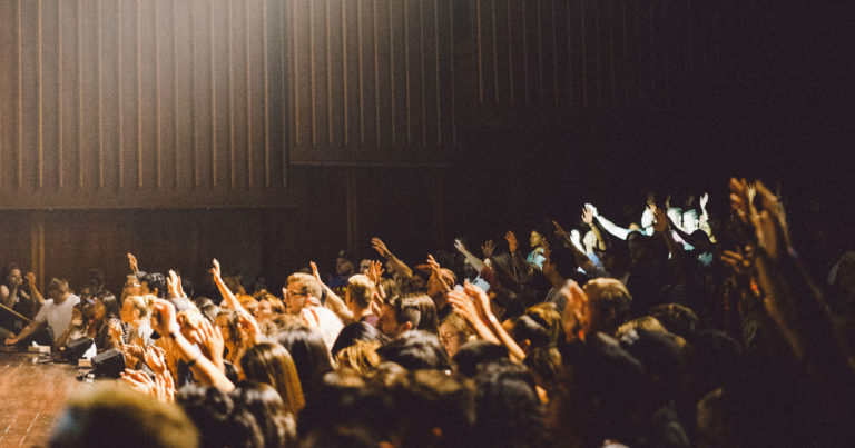 conference-crowd-raising-their-hands - Leadership Vision